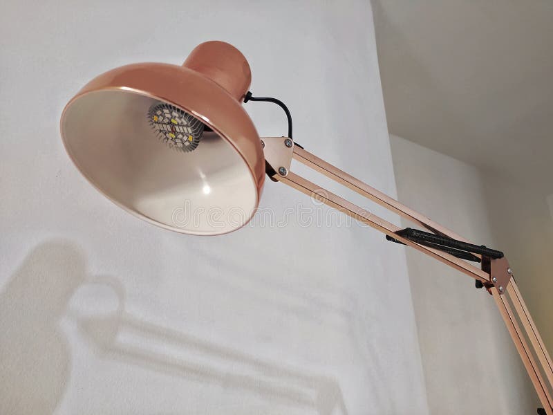 Pink Lamp Turned Off Shot Against a White Wall Stock Photo - Image of ...