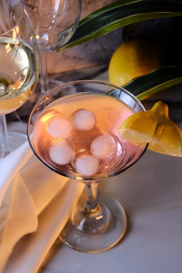 Pink Lemon Martini stock image. Image of martini, marble - 238271627