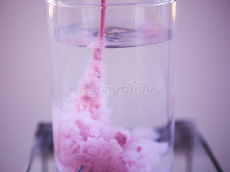 Pink Liquid in Water in a Science Lap Stock Image - Image of mixing ...