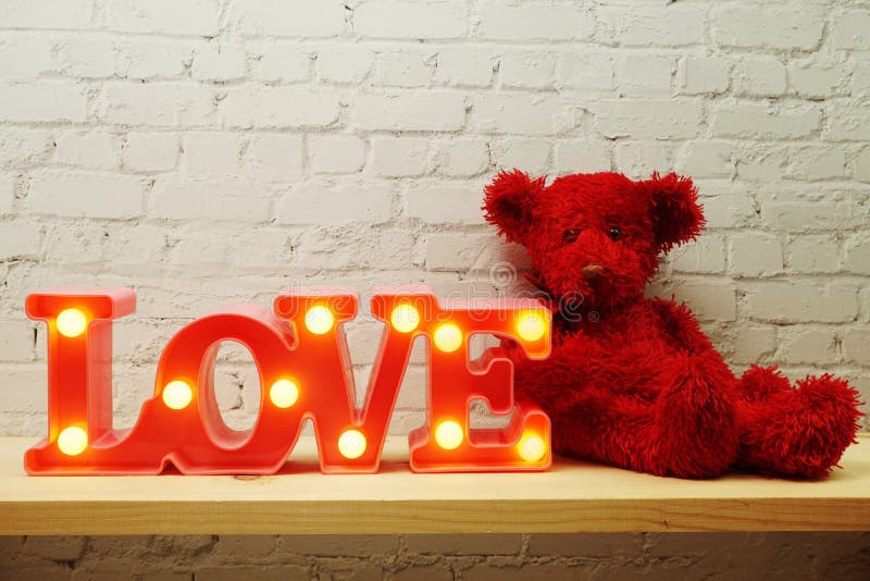 Pink Love LED Decorative on White Brick Wall Background Stock Image ...