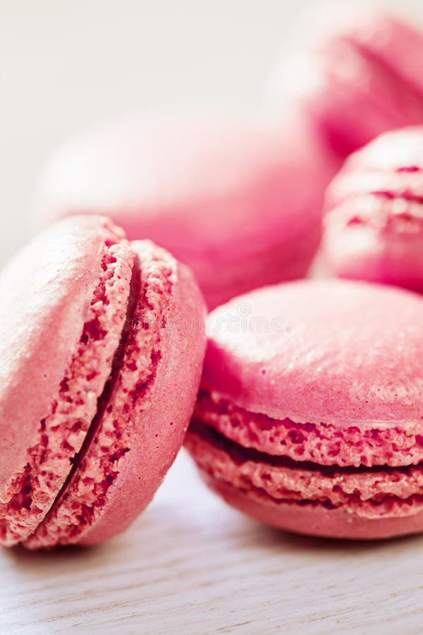 Pink macaroons on plate stock photo. Image of macaroons - 153966118