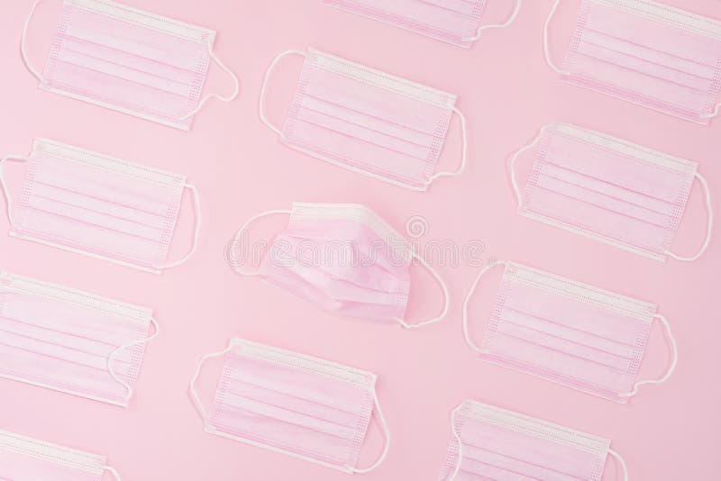 Pink Masks on Pink Paper Background. Creative Concept. Pattern. Flat ...