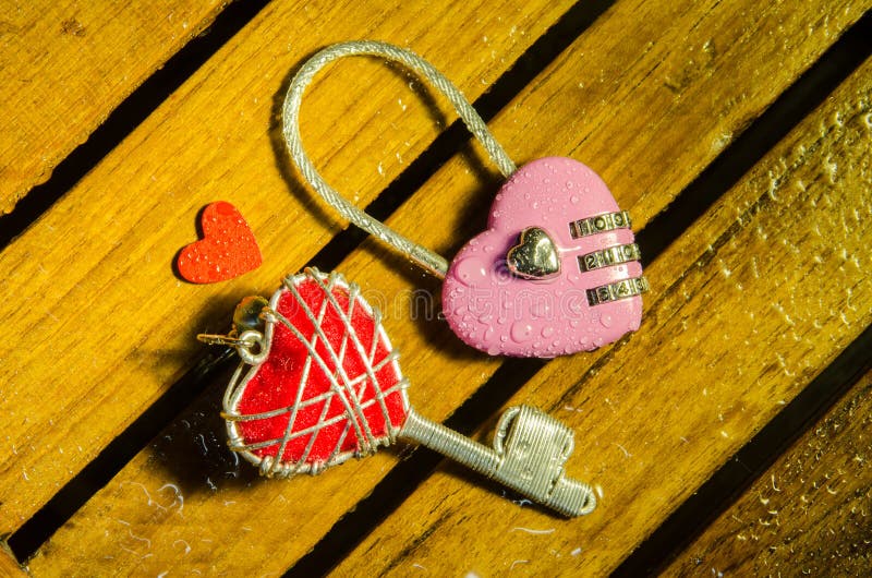 Pink Master in Heart Shape Key and Red Heart Key Stock Photo - Image of ...