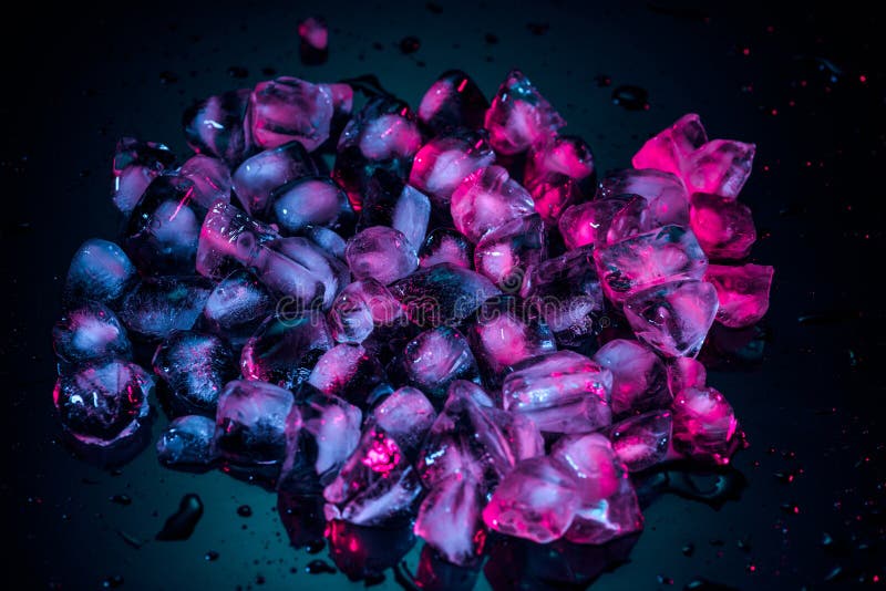 Pink Melting Ice Cubes on Black Stock Photo - Image of studio ...