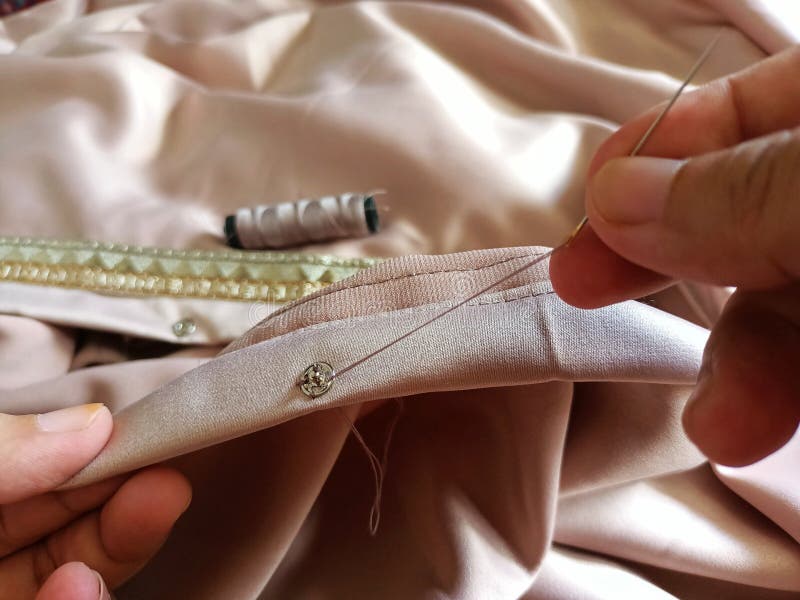 Pink Mocha Thread and Needle Sewing Tools Press Studs Stock Photo ...