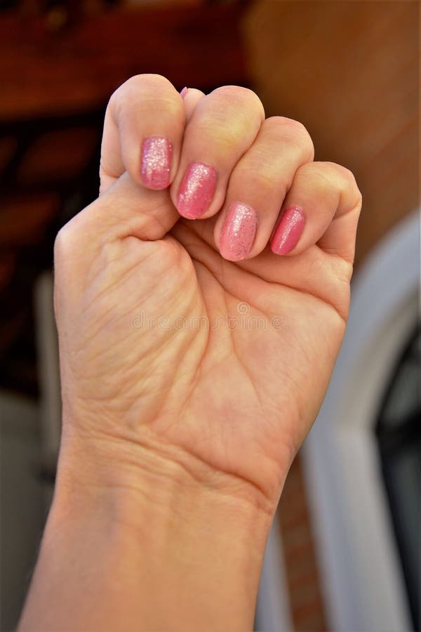 Pink Nail Polish Painted with Glitter Stock Photo - Image of hand ...