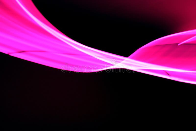 Pink Neon Light Ribbon Due To Exposure Time and Camera Shake Stock ...
