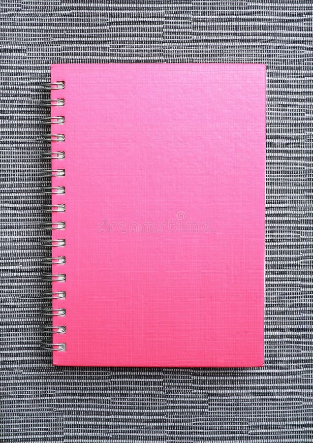 A Pink Notebook on Wall Covering Stock Photo - Image of pattern, design ...