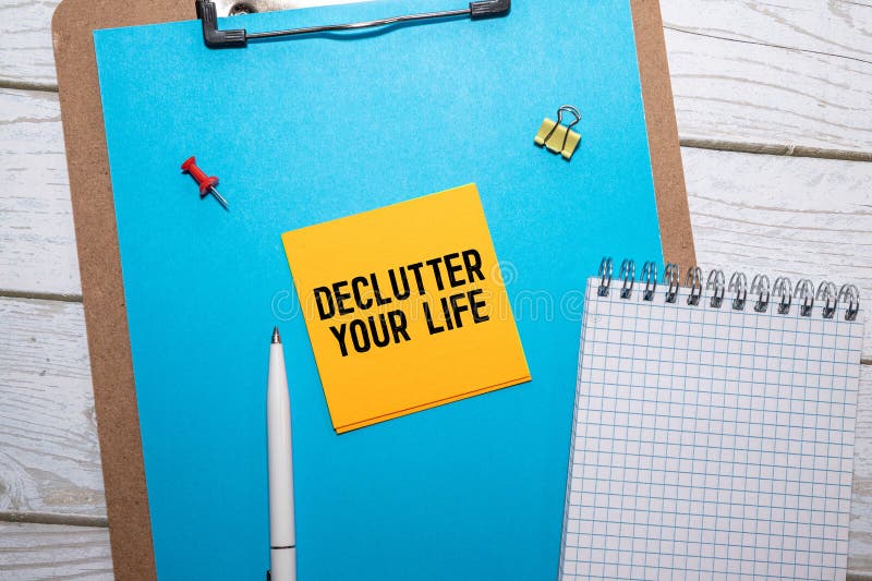 Pink Office Desk with Keyboard and Notebook, Text DECLUTTER YOUR LIFE ...