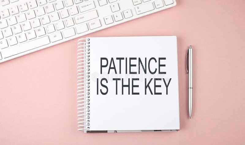 Pink Office Desk with Keyboard and Notebook with Text PATIENCE is the ...