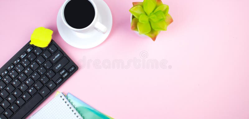 Pink Office Table with Computer, Pen and a Cup of Coffee, Lot of Things ...