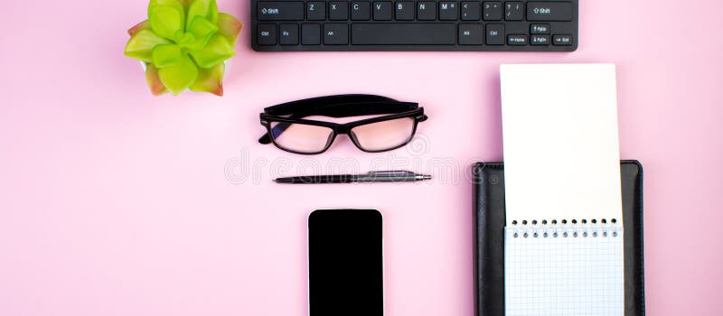 Pink Office Table with Computer, Pen and a Cup of Coffee, Lot of Things ...