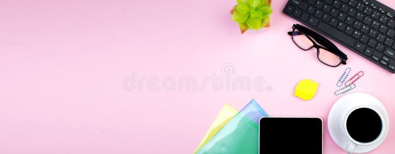 Pink Office Table with Computer, Pen and a Cup of Coffee, Lot of Things ...