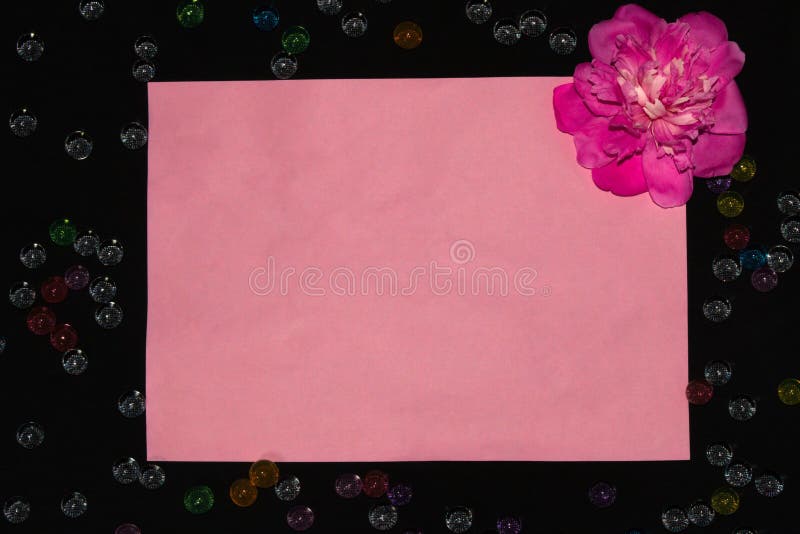 Pink Paper in Space with a Flower Head in the Corner Stock Photo ...