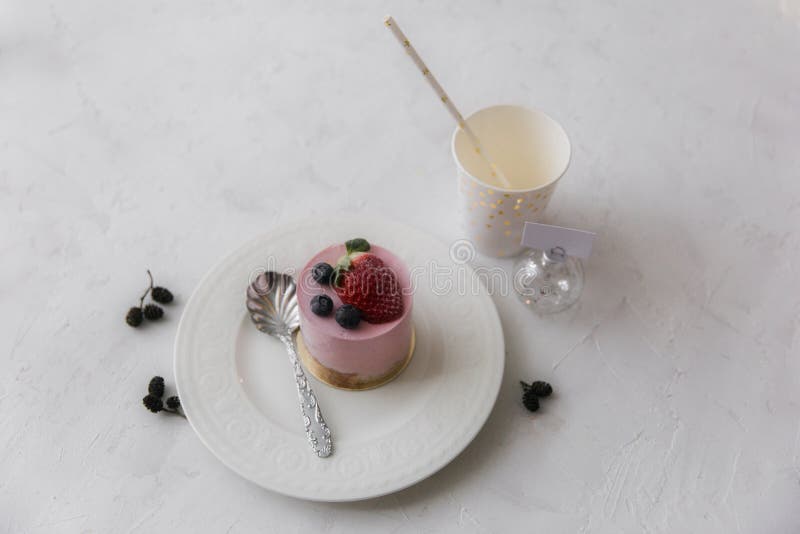 Pink Pastry in a Plate on the Table Stock Image - Image of snack, plate ...