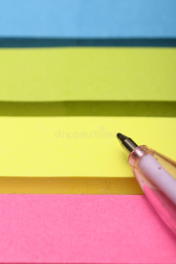 Pink Pen and Colored Pieces of Paper Stock Photo - Image of blue, love ...