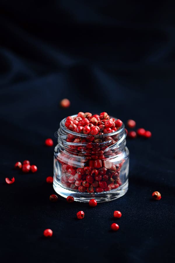 Pink Pepper Spice On Dark Background Stock Photo - Image of cooking ...