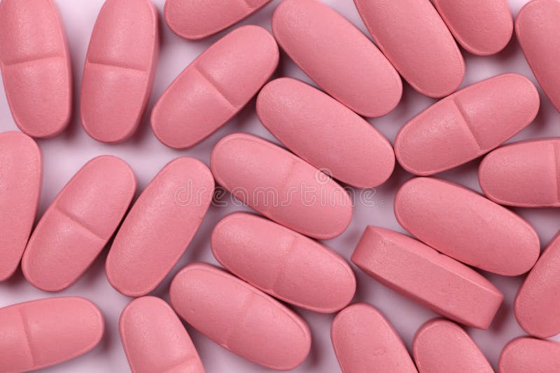 Pink pills stock photo. Image of spilling, tablet, painkiller - 44664470