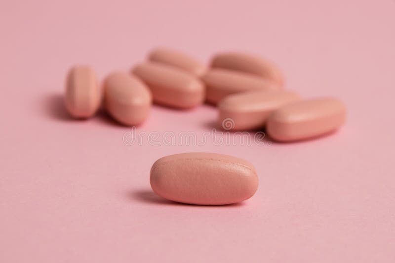 Pink Pills Macro on Pink Paper Background with Copy Space. the Concept ...