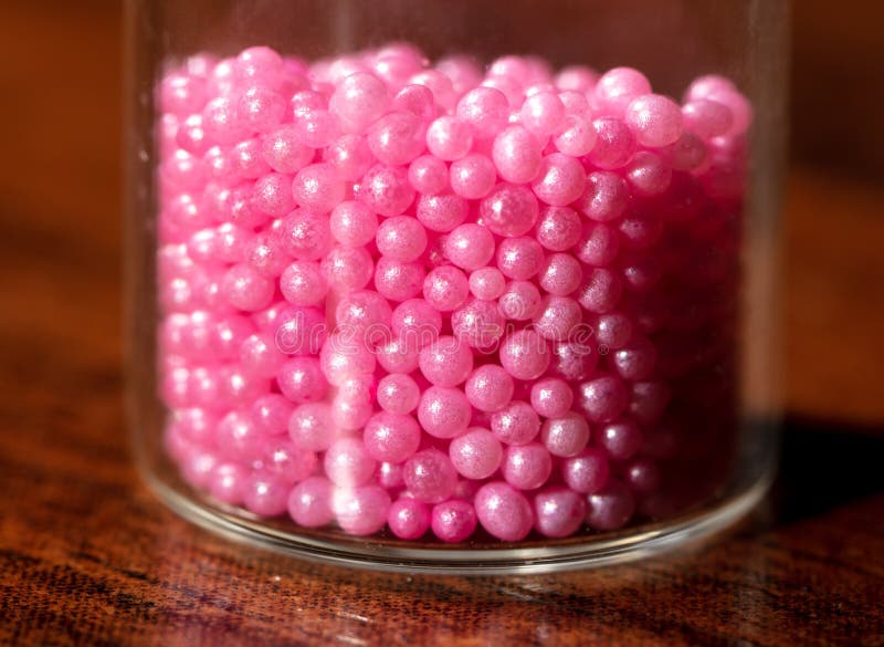 Pink Plastic Balls in a Glass Jar Stock Image - Image of plastic, macro ...