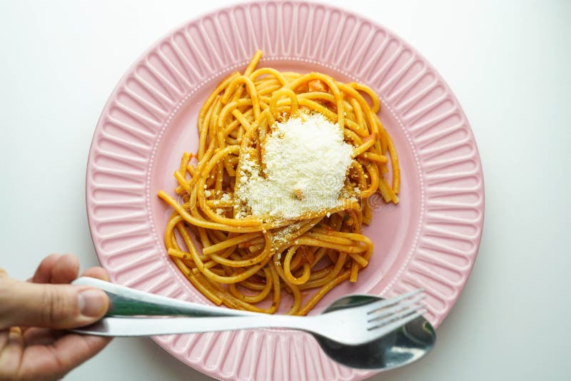 Pink Plate of Fresh Spaghetti with Tomato Sauce and Parmesan Cheese ...