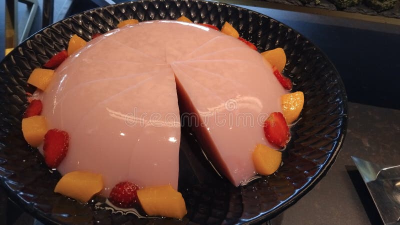 Pink Pudding with Mango and Strawberry Topping Stock Photo - Image of ...