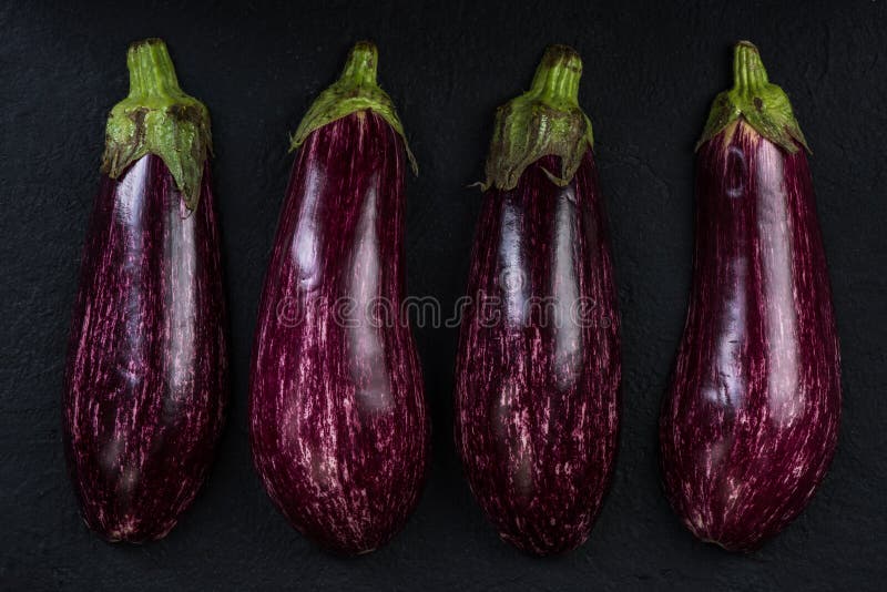 Pink or Purple Aubergine on Dark Slate Stock Image - Image of market ...
