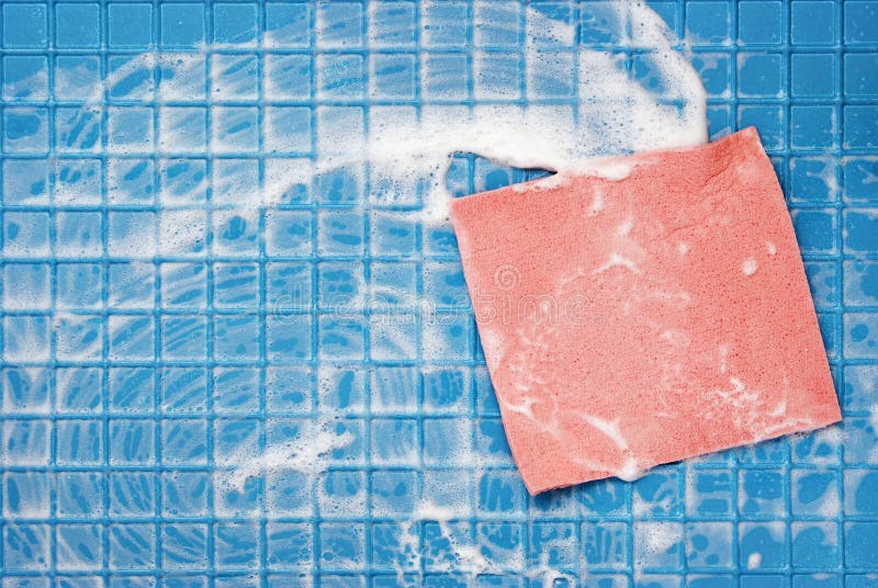 Pink Rag in White Foam on a Blue Stock Photo - Image of surface, wash ...
