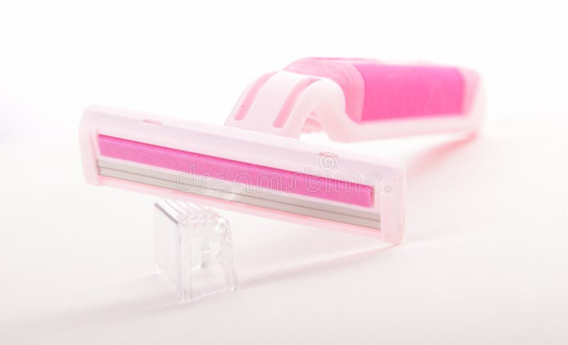Pink razor on white stock image. Image of zone, cosmetics - 23940141