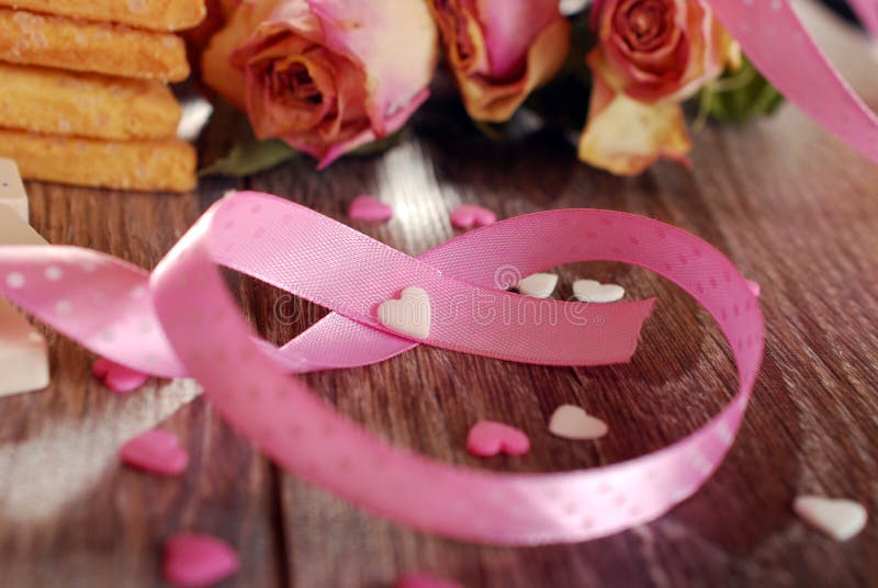 Pink ribbon in heart shape stock photo. Image of pink - 37829176