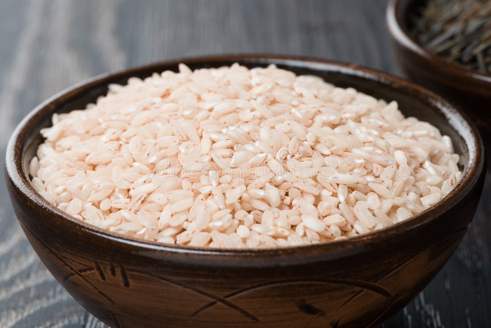 Pink Rice in Ceramic Bowl, Close-up Stock Image - Image of brown, grain ...