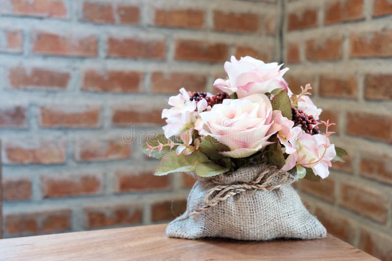 Pink rose on the table stock image. Image of background - 66461005