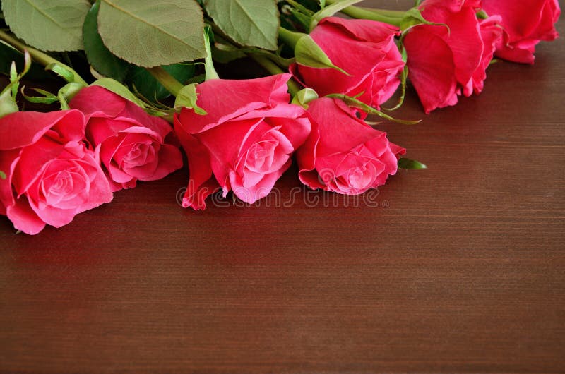 Pink Roses and Ranunculus Flowers with Ivy Green Leaves in a Corner ...