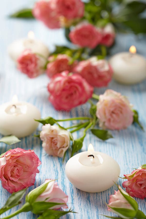 Pink roses and candles stock photo. Image of candle, light - 38448764