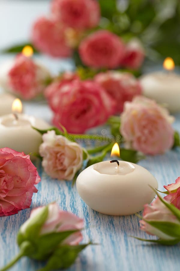 Pink roses and candles stock image. Image of natural - 38448775