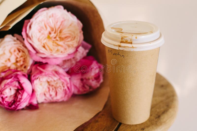 Pink roses and coffee stock image. Image of assortment - 70879177