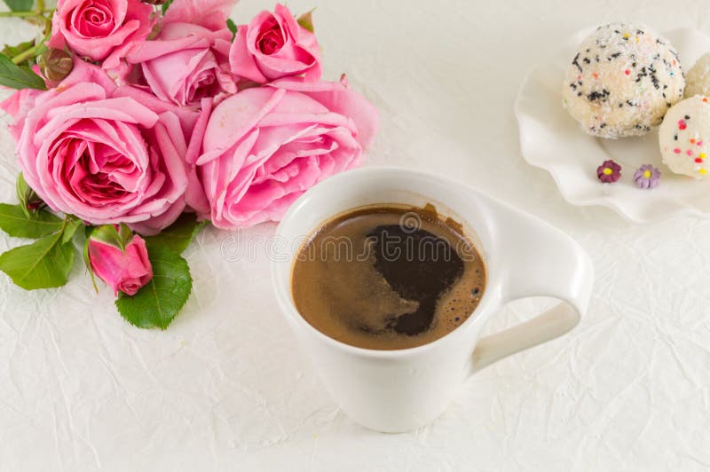 Pink Roses and a Coffee Cup Stock Photo - Image of coffee, celebration ...