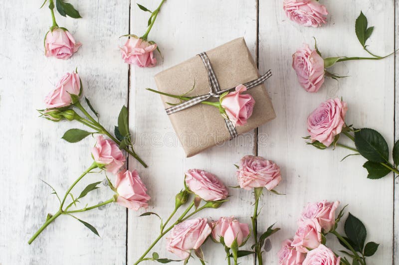 Pink Roses and a Gift Boxes Stock Photo - Image of coupon, label: 95145896