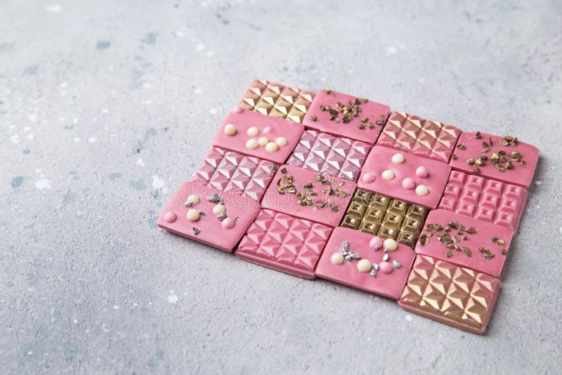 Pink Ruby Chocolate Bars with Gold, Silver and Crisp Stock Image ...