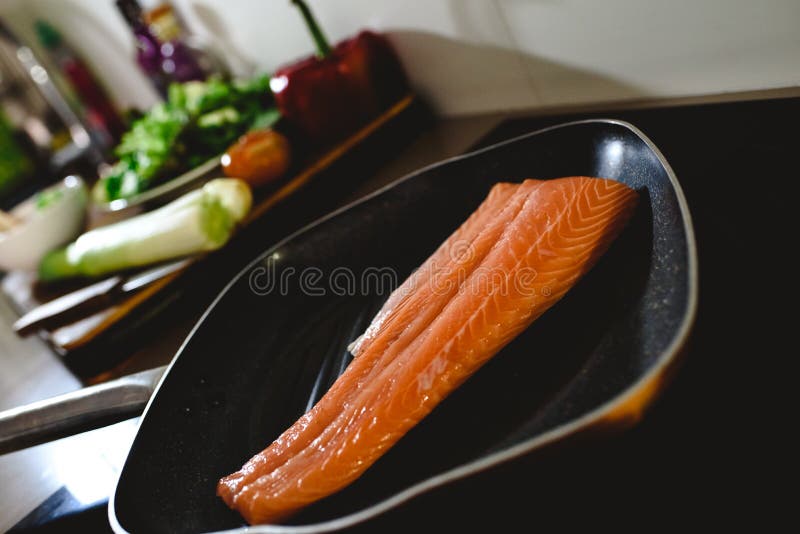 Pink Salmon Fillet in a Frying Pan before Cooking it Stock Image ...