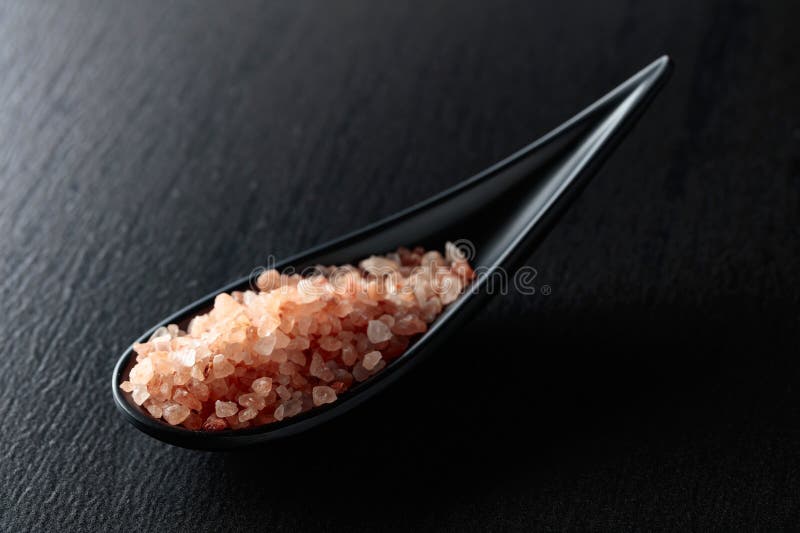 Pink Salt on a Black Ceramic Table Stock Photo - Image of alternative ...