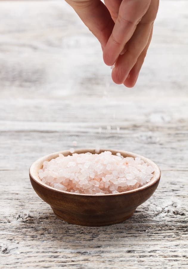 Pink salt stock image. Image of seize, gesture, bowl - 34103077