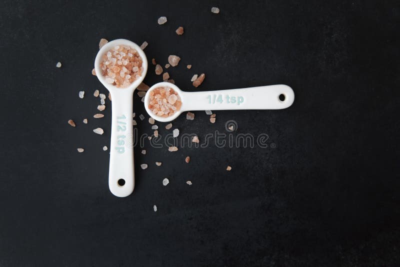 Salt in measuring teaspoon stock photo. Image of isolated - 4117076