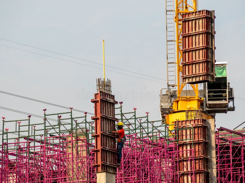 The Pink Scaffolding on the Building Under Construction Stock Photo ...