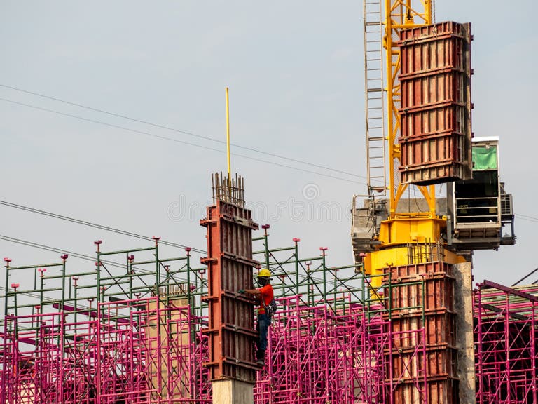 The Pink Scaffolding on the Building Under Construction Stock Photo ...