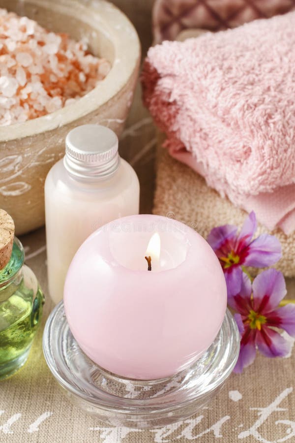 Pink Scented Candle Soft Towels And Bowl Of Sea Salt Stock Image