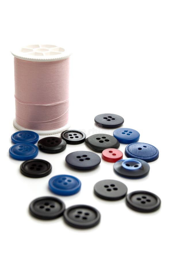 Pink Sewing Thread with Blue and Black Buttons Stock Photo - Image of ...