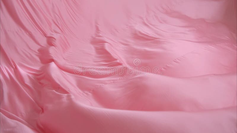 A Pink Sheet of Fabric with a Wave Pattern Stock Video - Video of ...