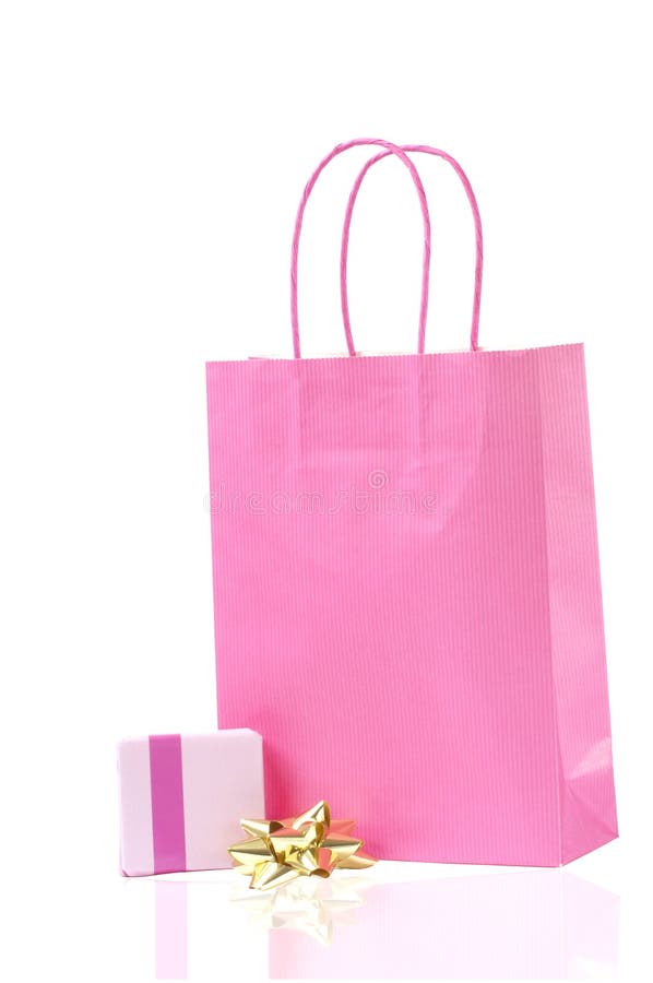 Pink Shopping Bag and a Wrapped Present Stock Photo - Image of golden ...