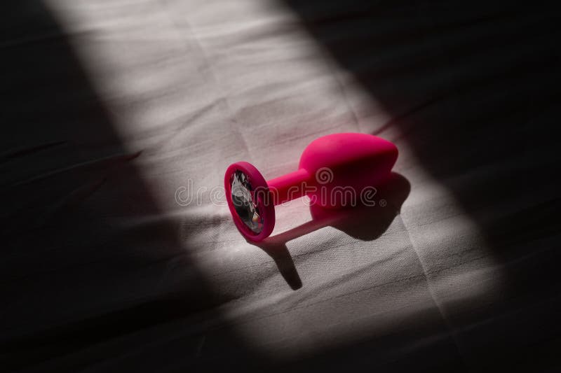 Pink Silicone Anal Plug on a White Sheet. Stock Photo - Image of anal ...